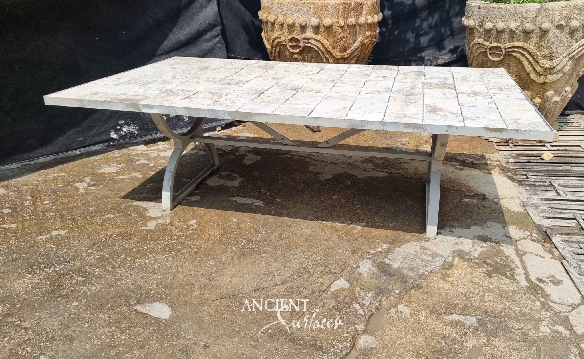 The Unique Allure of Reclaimed Stone Tables Offered by Ancient Surfaces